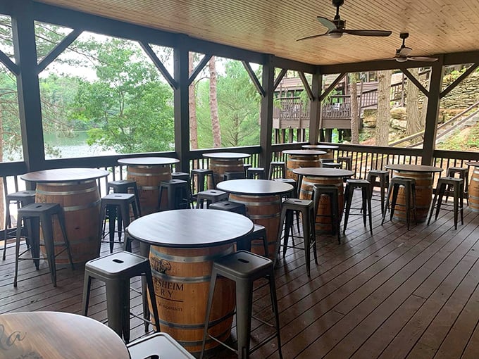 The outdoor patio with barrel tables offers fresh air with your fresh drinks—nature's cocktail hour at its finest.