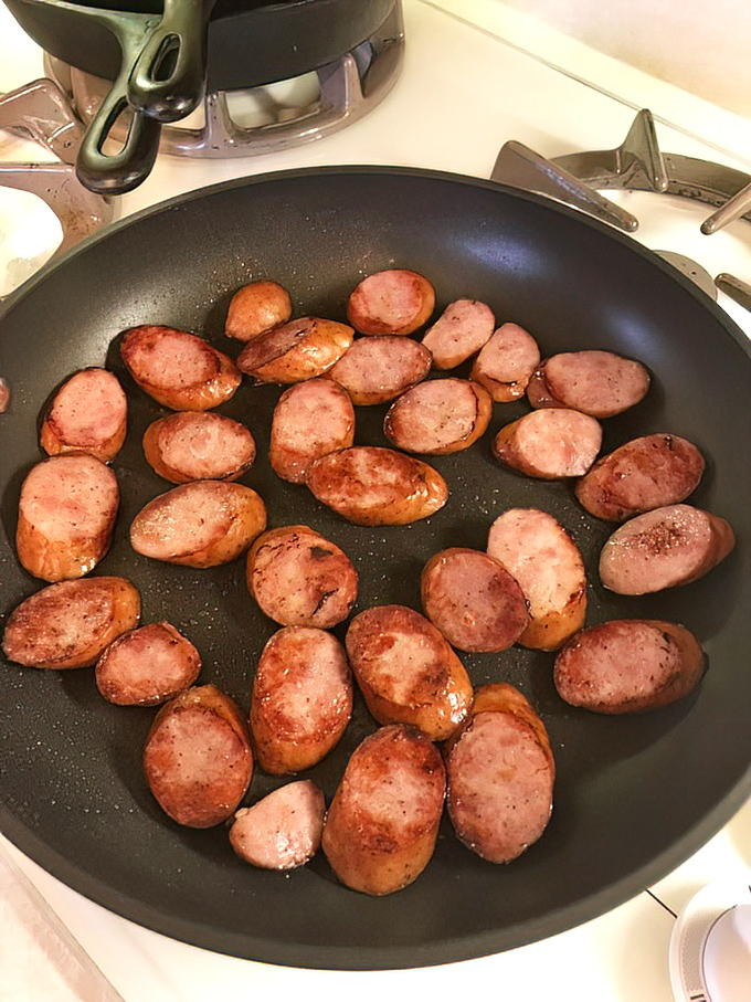 Sizzling kielbasa slices – the sound alone is enough to make your mouth water and your cardiologist nervous.