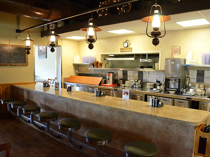 Counter seating where solo diners become temporary neighbors. Those vintage-style lantern lights aren't trying to be Instagram-worthy – they just naturally are.