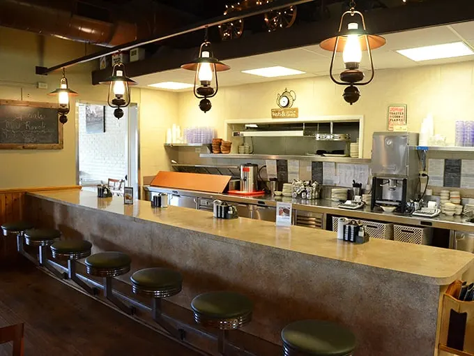 Counter seating where solo diners become temporary neighbors. Those vintage-style lantern lights aren't trying to be Instagram-worthy – they just naturally are.