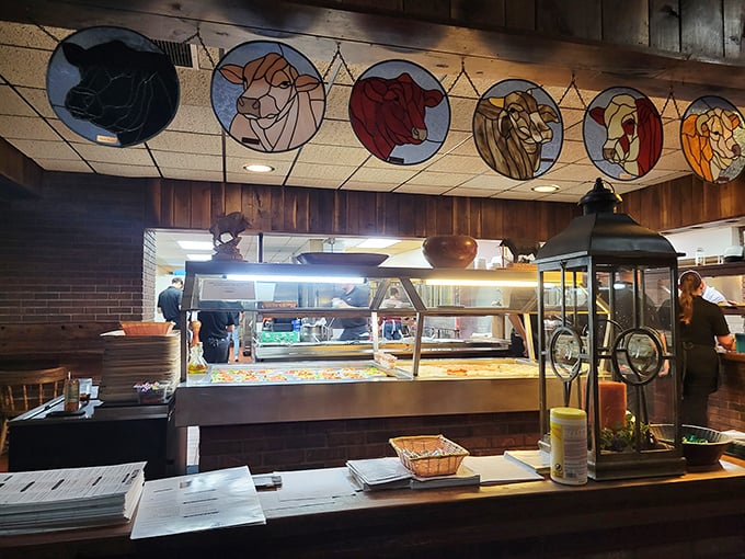 Beautiful stained glass cattle medallions watch over the serving area – guardian angels of the carnivore's paradise below.