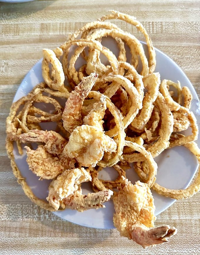 A seafood spread that would make Neptune himself put down his trident and pick up a fork—crab legs, fried delights, and sides galore!