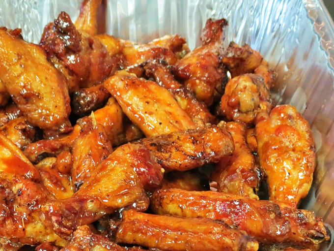Wings that have achieved barbecue enlightenment. These aren't bar food afterthoughts; they're the result of smoke mastery and sauce philosophy.