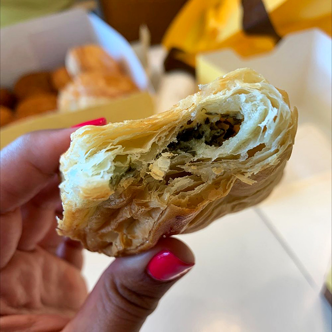 This pastry reveals its flaky layers like a good novel—each bite unfolding a new dimension of buttery, savory storytelling.
