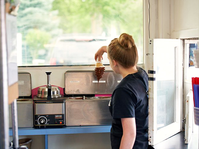 The soft-serve machine—where dairy dreams come true. Each twist requires the perfect wrist technique, a skill passed down through generations of ice cream artisans. 