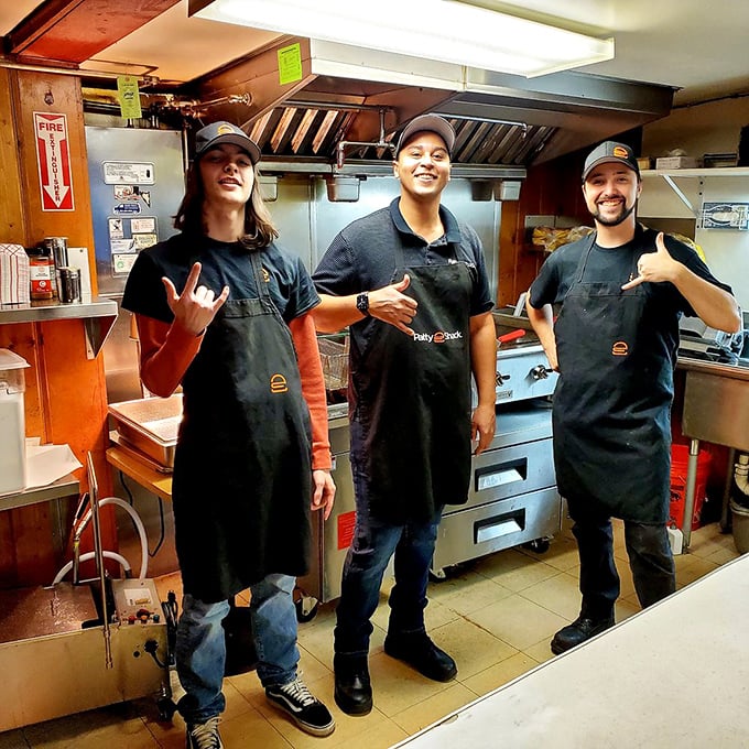 The culinary heroes behind the counter, armed with spatulas and the secret to happiness. 