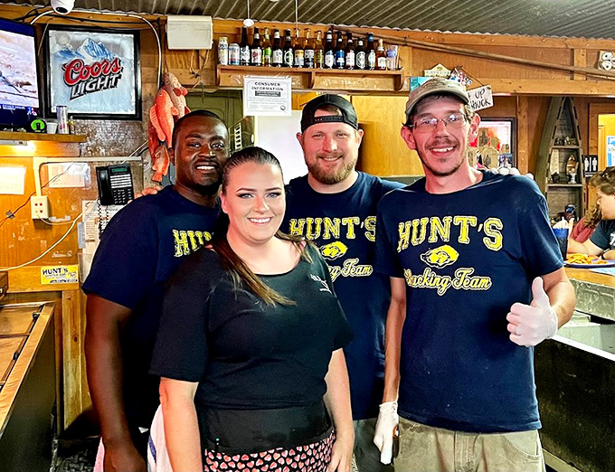 The shucking team at Hunt's doesn't just prepare food—they're craftspeople practicing an art form that's been perfected over countless oysters and smiles.