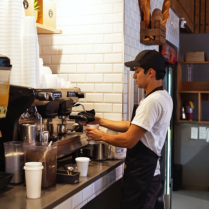 Behind every perfect cup of coffee is someone who knows exactly how long to steam milk – the unsung heroes of our morning rituals at work.