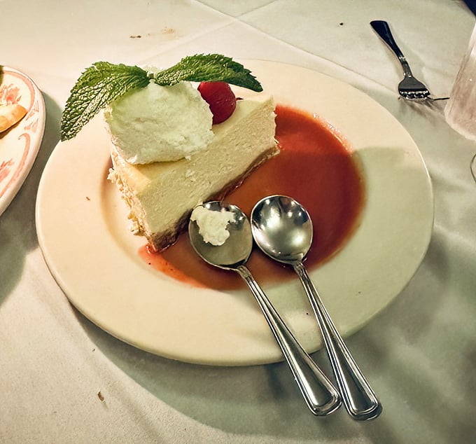 Cheesecake with a strawberry companion that's like the perfect marriage—one enhances the other, and you're just happy to be invited to the party.
