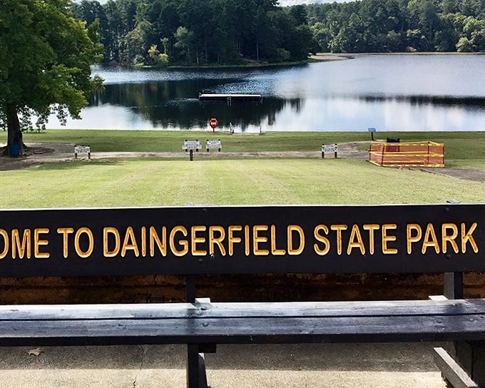 The welcome sign frames a perfect lake view. No expensive resort needed when Mother Nature provides five-star accommodations like this.