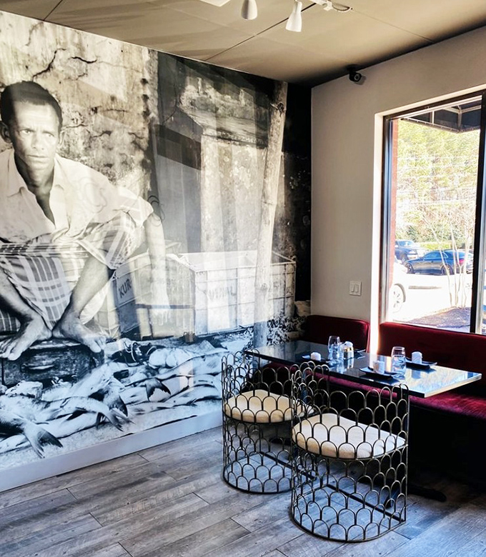 Art that honors seafood's heritage adorns the walls. A visual reminder that great food connects us to tradition and craft.