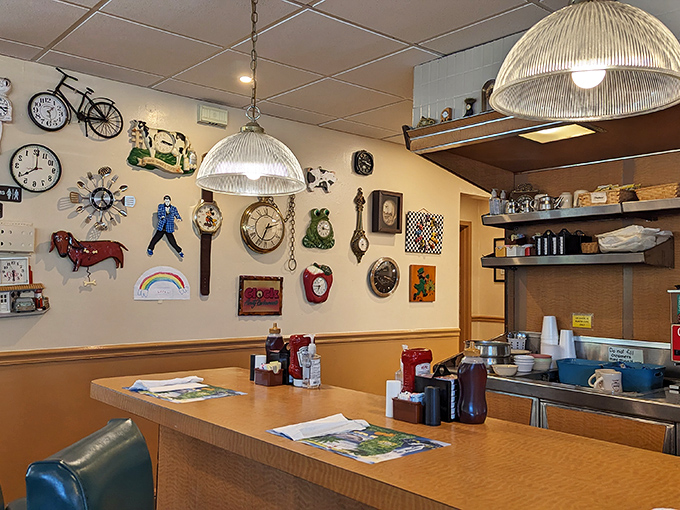 The wall of clocks isn't just decoration – it's the restaurant's beating heart. Each timepiece tells a story, much like the regulars who gather beneath them.