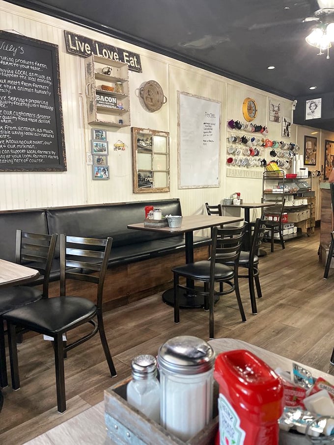 The "Live. Love. Eat." sign isn't just decor—it's the restaurant's philosophy in three simple words. The collection of mugs tells stories of countless morning coffees.