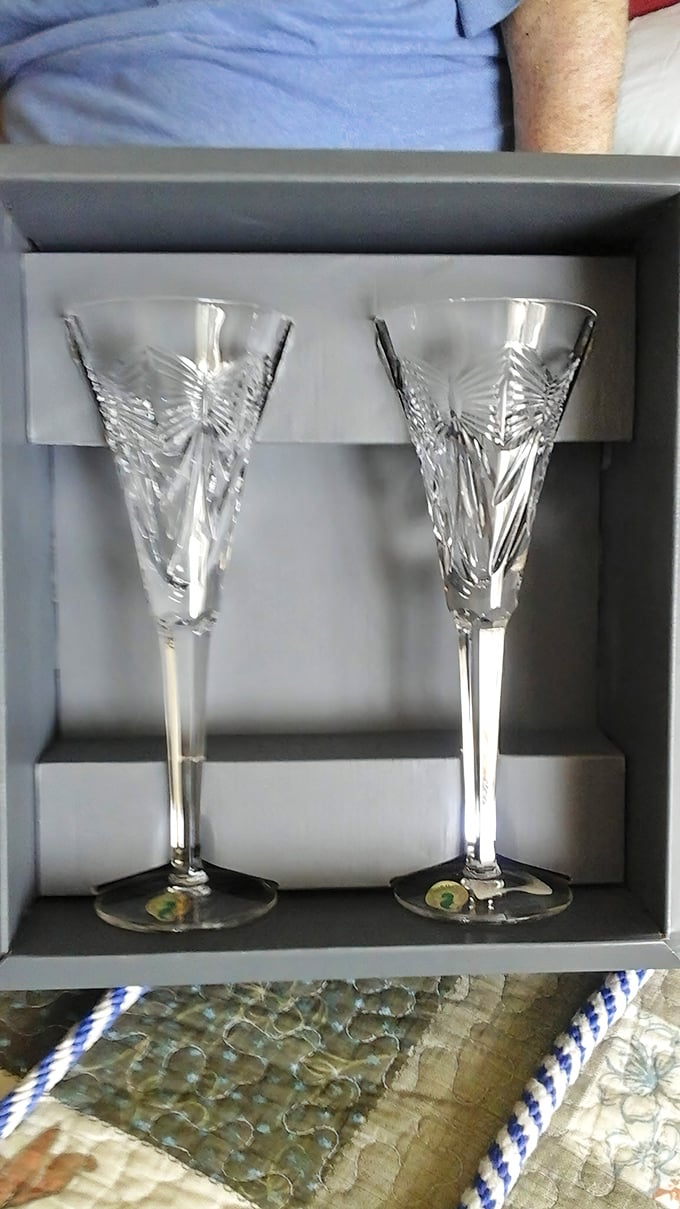 Crystal that catches light and attention—these Waterford flutes wait patiently for their next celebration, champagne optional but recommended.