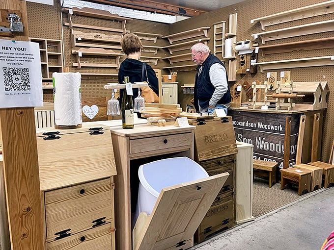 Craftsmanship lives on! This woodworker's booth showcases handmade furniture pieces that combine traditional skills with practical modern design.