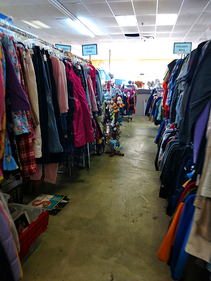 Racks upon racks create a textile sea of possibility. The thrill of the hunt is what makes thrift shopping an adventure rather than a chore.
