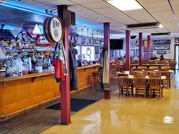 Where locals belly up to swap fish tales and sip cold beers—the bar area that's witnessed decades of post-crab feast satisfaction.