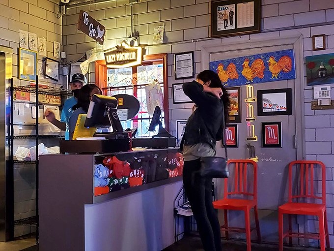 Where the magic begins—the counter where hungry patrons place orders that will soon change their definition of fried chicken.