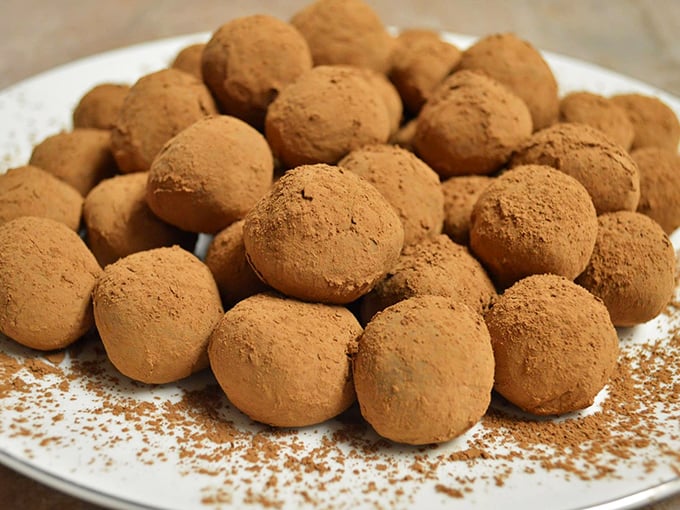 Cocoa-dusted truffles lounging like royalty. These powdery spheres of chocolate perfection are the aristocrats of the candy counter—sophisticated yet approachable.