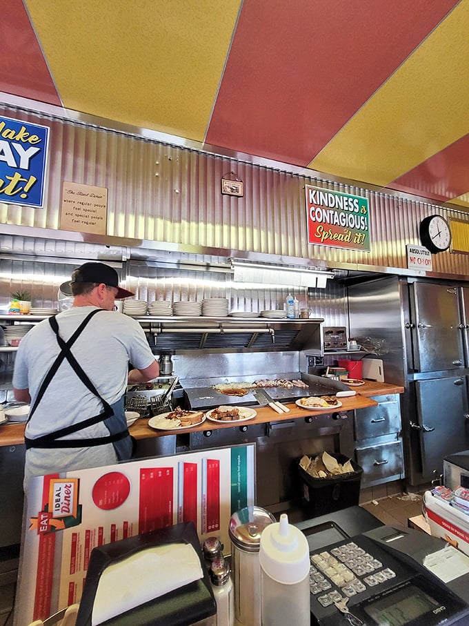 The open kitchen isn't for show—it's a stage where breakfast performers have been earning standing ovations for decades.