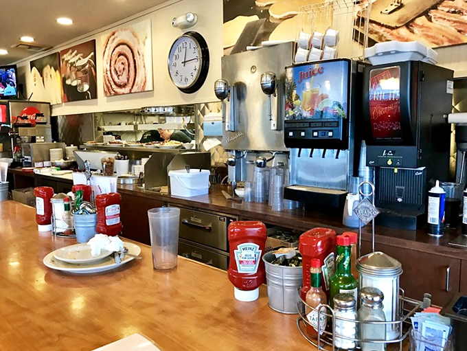 The beating heart of any great diner—where condiments stand ready and coffee machines hum the day's first melody.