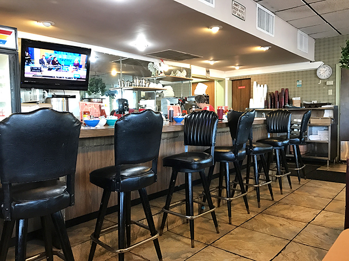 The counter seats at Jimmy's offer front-row tickets to the greatest show in Miami: short-order cooks performing breakfast ballet.