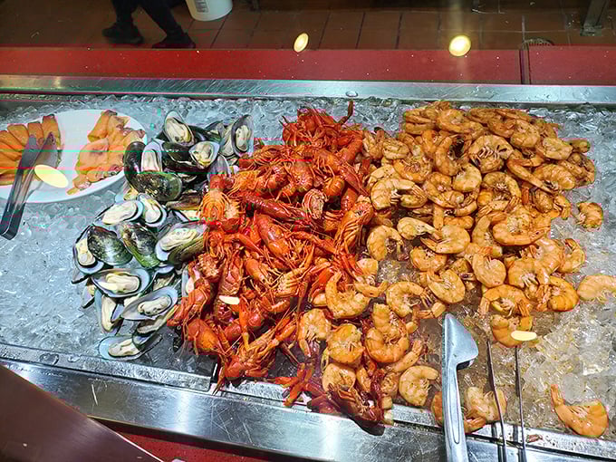 A trio of ocean treasures on ice: green-lipped mussels, crawfish, and peel-and-eat shrimp—like Neptune's jewelry box opened for public viewing.
