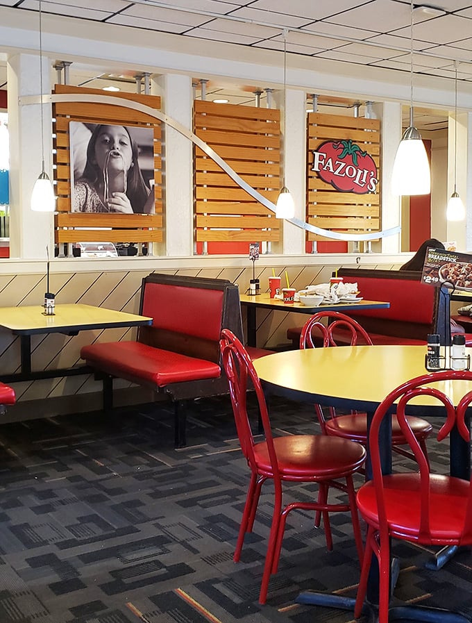 Those wooden slat dividers and pendant lights add just enough ambiance to make you forget you're in a fast-casual restaurant – until another breadstick server appears.