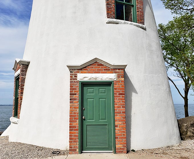 That jaunty green door isn't just an entrance—it's a portal to two centuries of maritime history and countless lighthouse keeper footsteps.