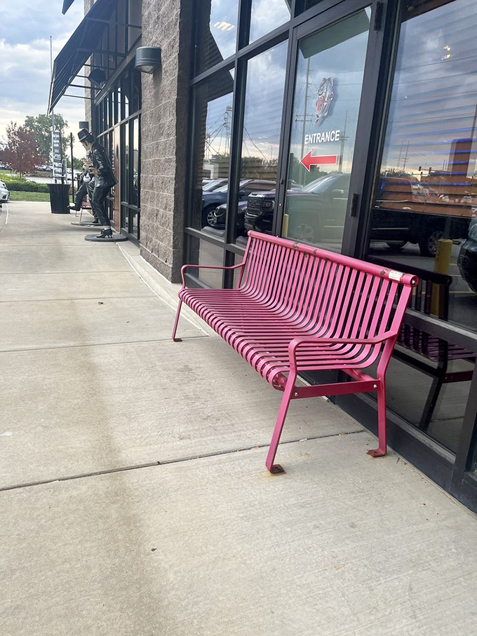 That pink bench outside isn't just seating—it's the perfect spot to recover from the food euphoria you've just experienced inside.