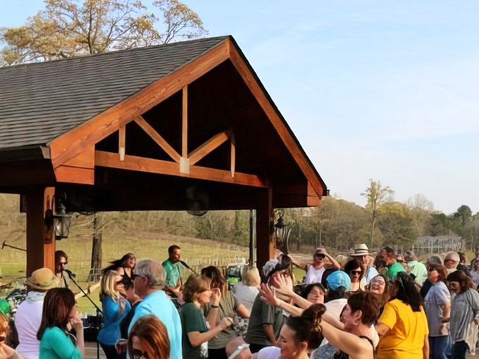 Community gatherings under rustic pavilions bring Monroe residents together for music and merriment – Social Security checks stretch further when entertainment comes with fellowship.