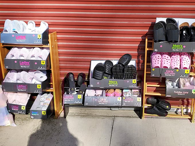 Footwear for the whole family lined up like a colorful chorus line. Nothing says "practical flea market find" quite like brand new shoes.