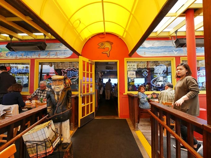 The entrance feels like passing through a portal to seafood paradise – bright colors promising the coastal meal of your dreams.