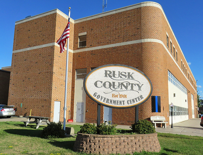 The Rusk County Government Center, established 1901, proves that bureaucracy can indeed have both history and character, unlike those soulless glass boxes in bigger cities.