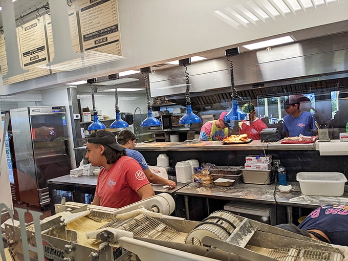 Where the magic happens: Jolly Rogers' kitchen crew transforms Lake Erie's bounty into the golden treasures that keep locals coming back.