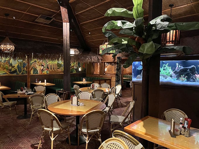 Aquariums glow like blue portals to another world, while banana plants reach toward bamboo ceilings in this perfectly preserved tiki time capsule.