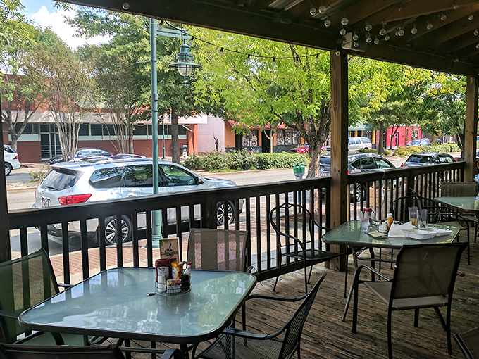The outdoor porch offers prime people-watching real estate while you contemplate which burger masterpiece to order next.