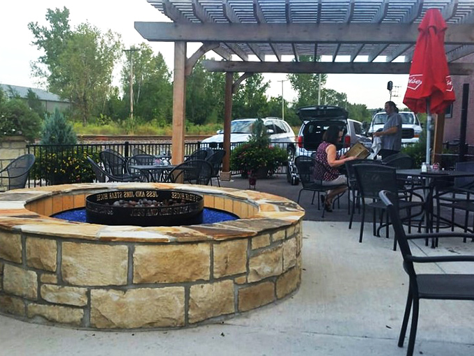 Outdoor seating with a fire feature for those who prefer their atmosphere as fresh as their beef. Nature and nurture in perfect harmony.