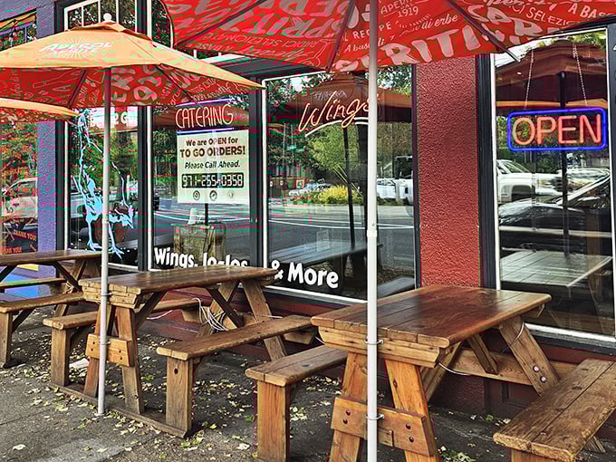 Outdoor tables where Portland's notorious rain takes a respectful step back to let you enjoy your chicken in peace. The "OPEN" sign is redundant—your nose already knew.
