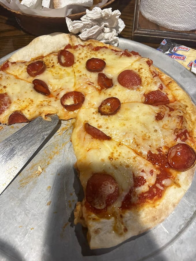 Pizza that doesn't try to be fancy because it doesn't need to be—just honest cheese, pepperoni, and a crust that knows its job.