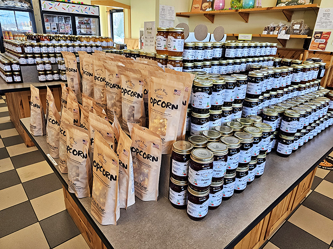 Popcorn bags stand at attention next to jam battalions—proof that Rise'n Roll has mastered snacks both sweet and savory.