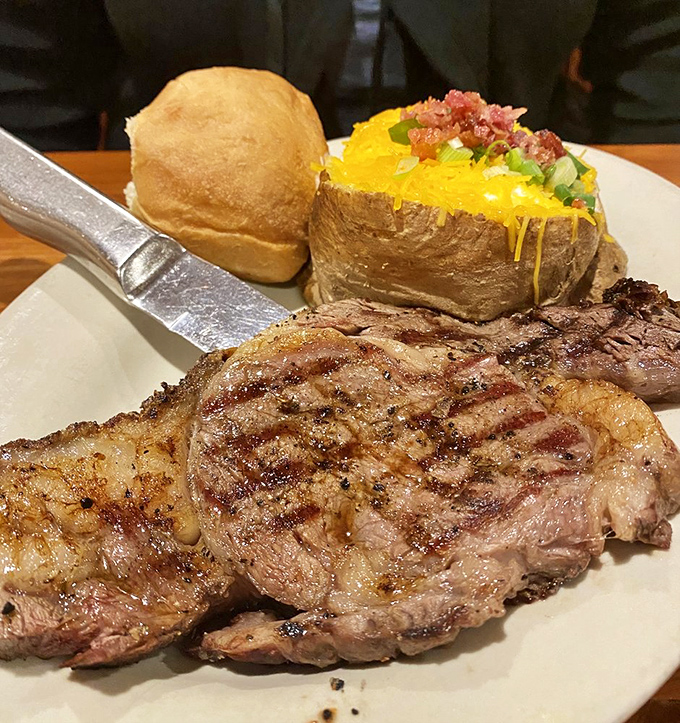 This prime rib isn't just dinner—it's a celebration on a plate, complete with a baked potato that's dressed for the occasion.