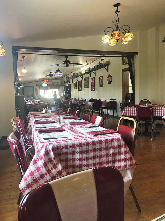 Empty tables waiting for the dinner rush—each one a blank canvas soon to be the setting for celebrations, reconnections, and food memories.