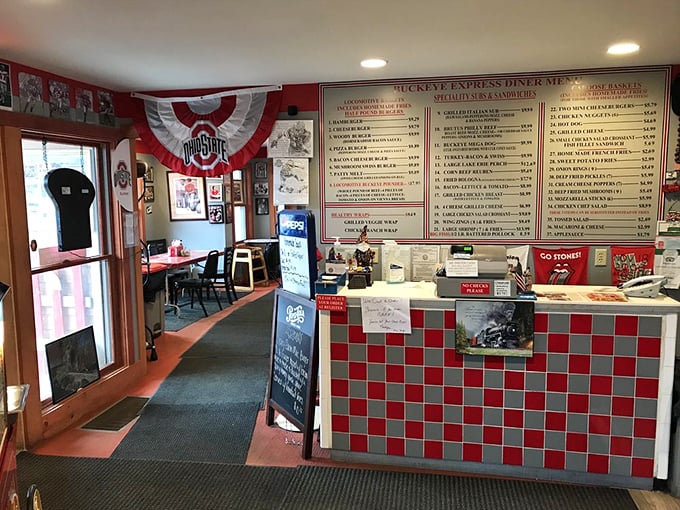 The heart of the operation—where orders are taken and culinary dreams come true. That menu board is basically a bucket list.