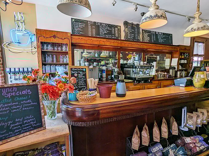 The command center where coffee dreams come true. That wooden counter has heard more breakfast epiphanies than a therapist's couch.