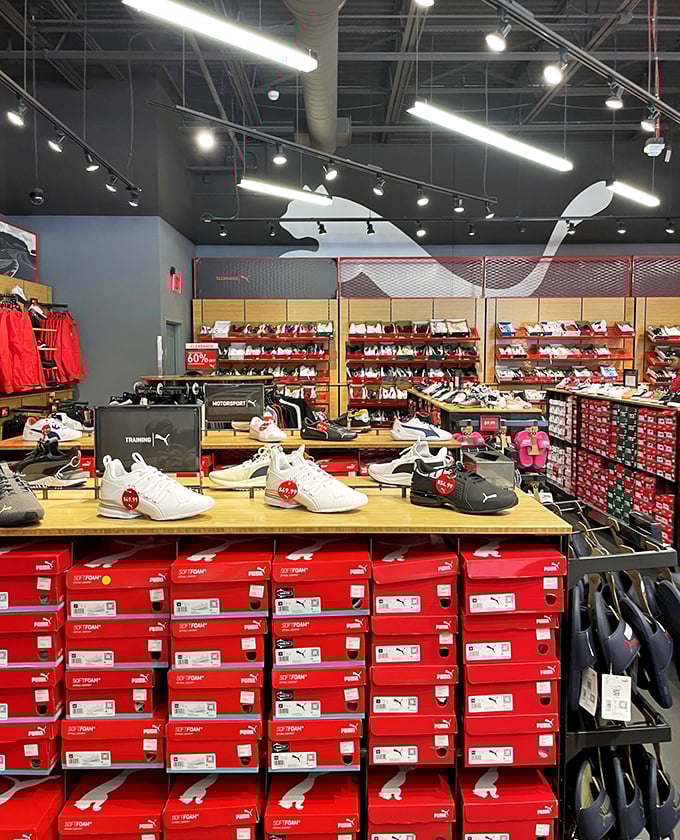 Puma's shrine to footwear, where red boxes stack like promises of faster runs, better jumps, and significantly more stylish grocery store trips.