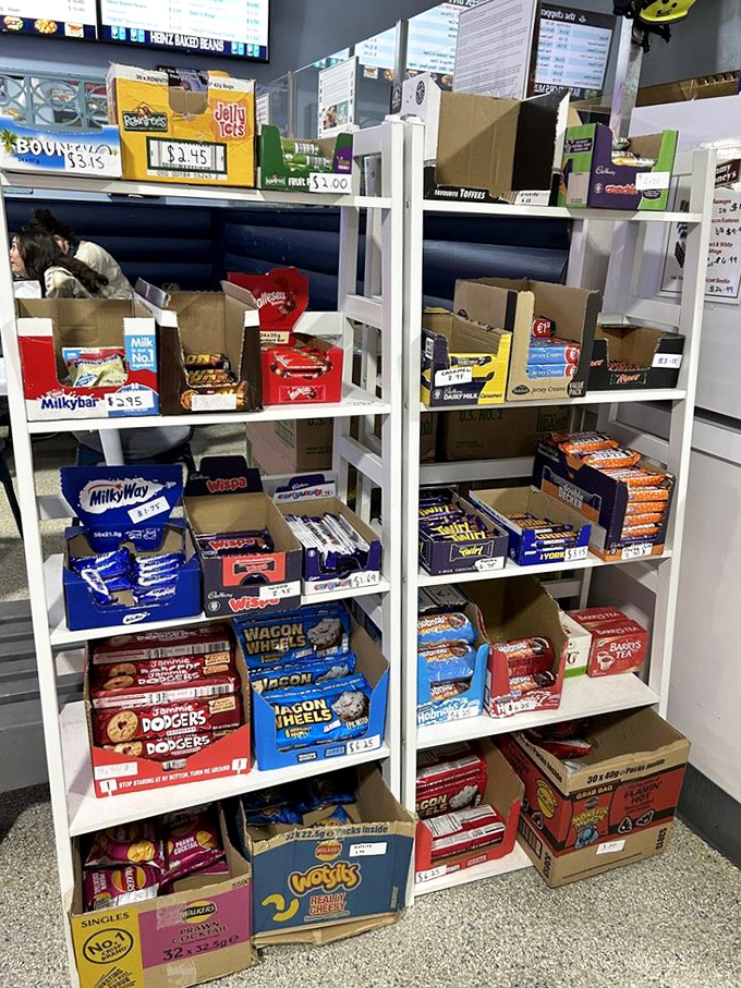 British candy shelves that would make Willy Wonka proud. Wagon Wheels and Milky Ways – a sweet taste of England after your savory feast.