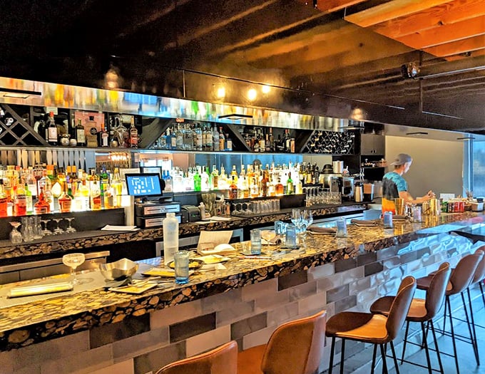A bar stocked for serious cocktail crafting. Those bottles aren't just decoration—they're waiting to become your next favorite libation.