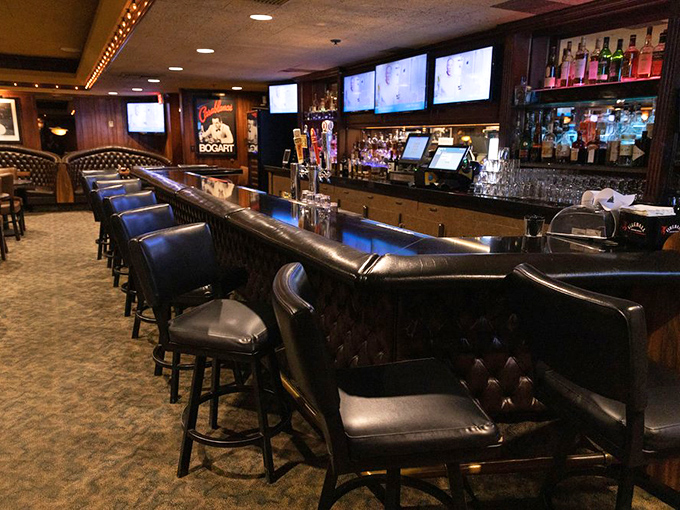 A bar that means business. The leather stools have supported generations of elbows, each with their own stories and preferred libations.