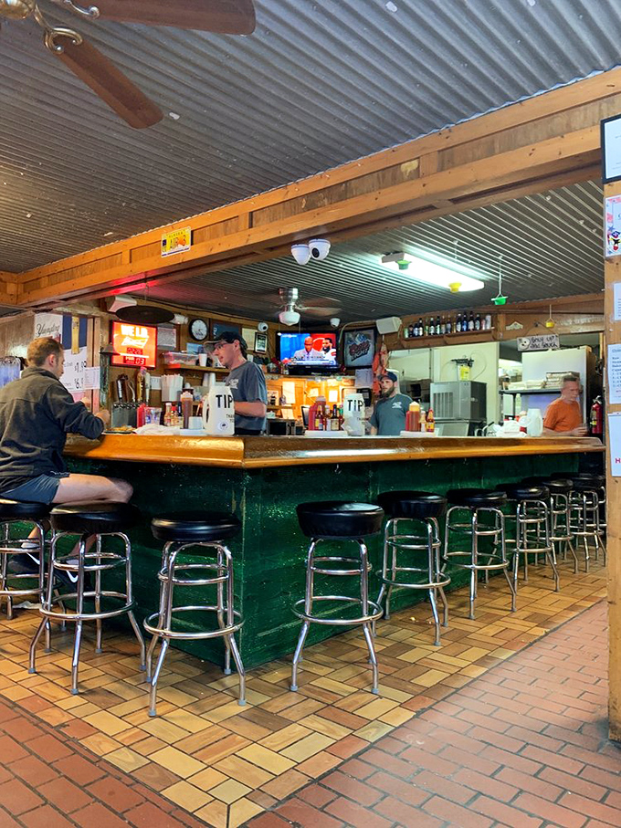 The bar at Hunt's isn't just where drinks are served—it's where seafood stories get taller and friendships grow deeper with each passing hour.